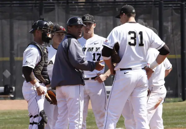 Why Do Baseball Coaches and Managers Wear Uniforms?